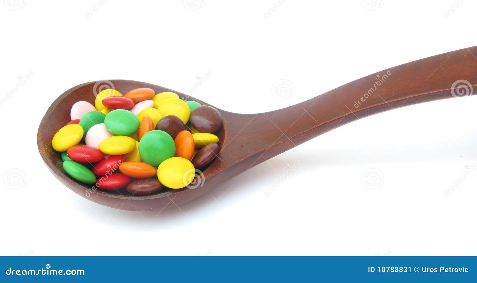 Wooden Spoon Filled with Candy Stock Image - Image of filled, brown ...