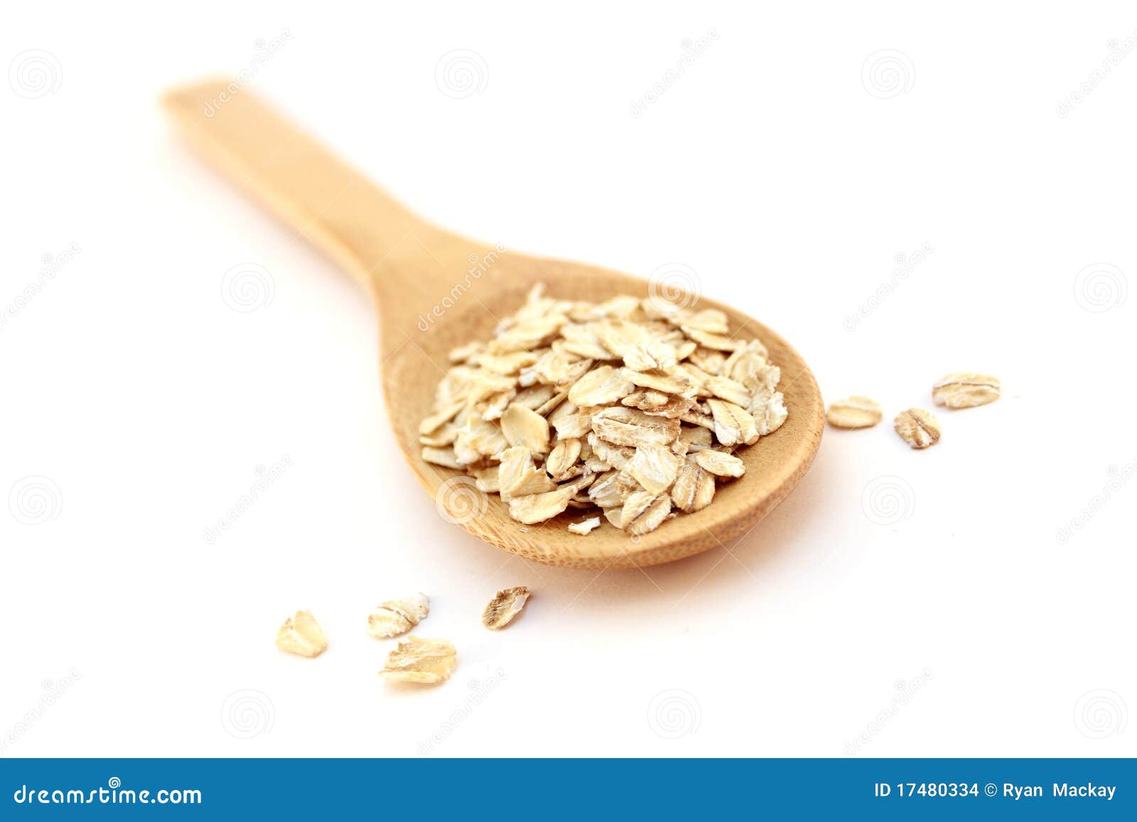 Wooden spoon and oatmeal stock photo. Image of oatmeal - 17480334