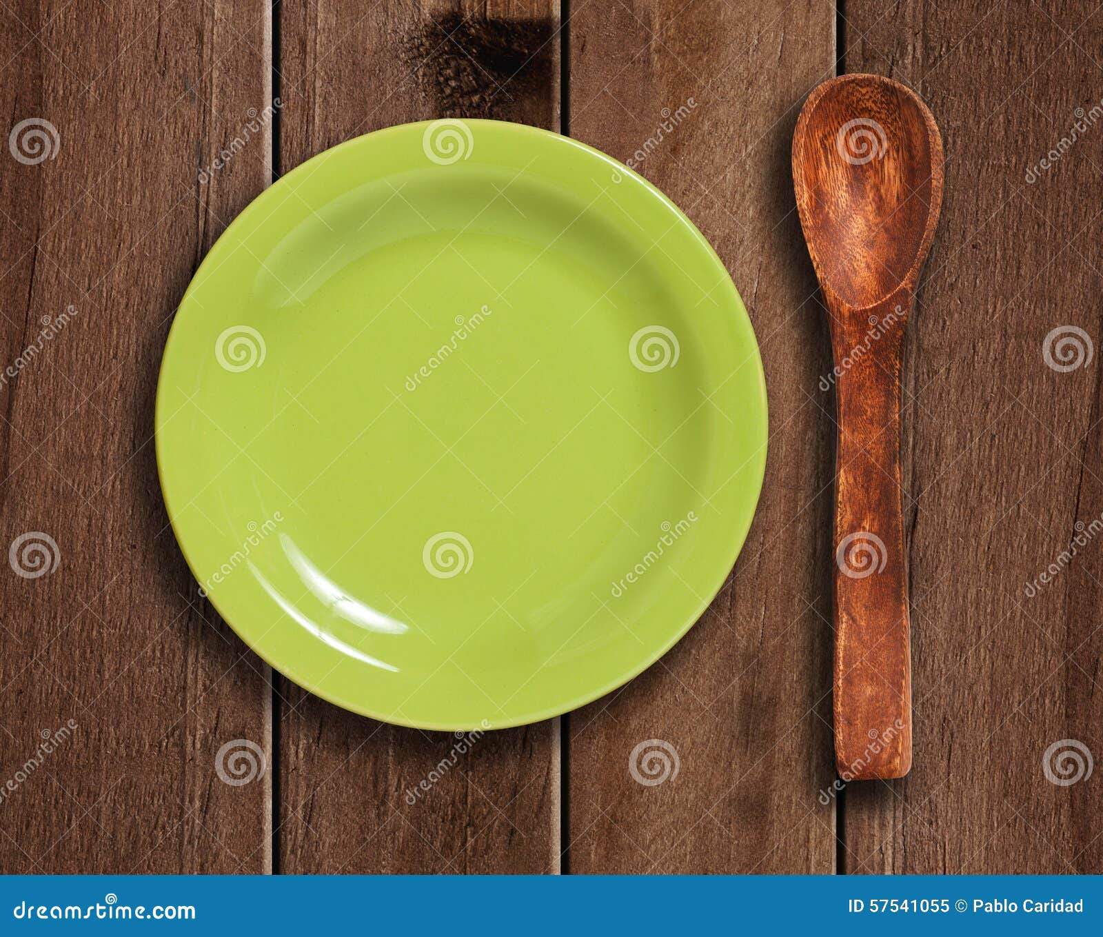 Wooden spoon and plate. stock image. Image of textured - 57541055