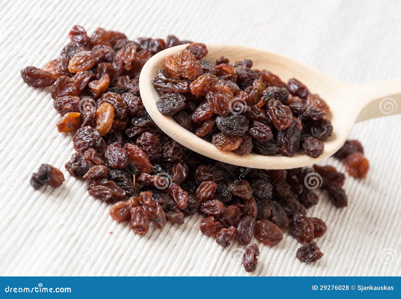 Wooden spoon with raisins stock photo. Image of diet - 29276028