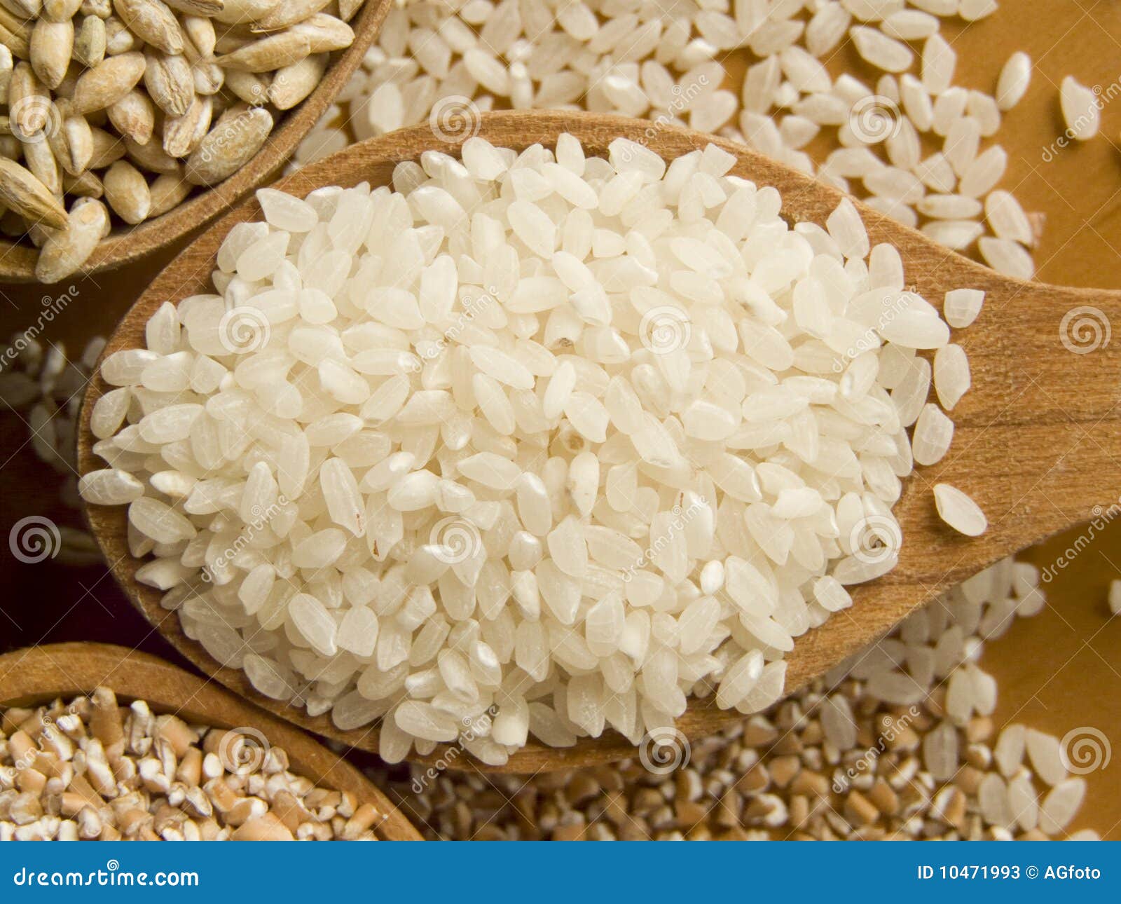 Wooden spoon with rice stock image. Image of close, meal - 10471993