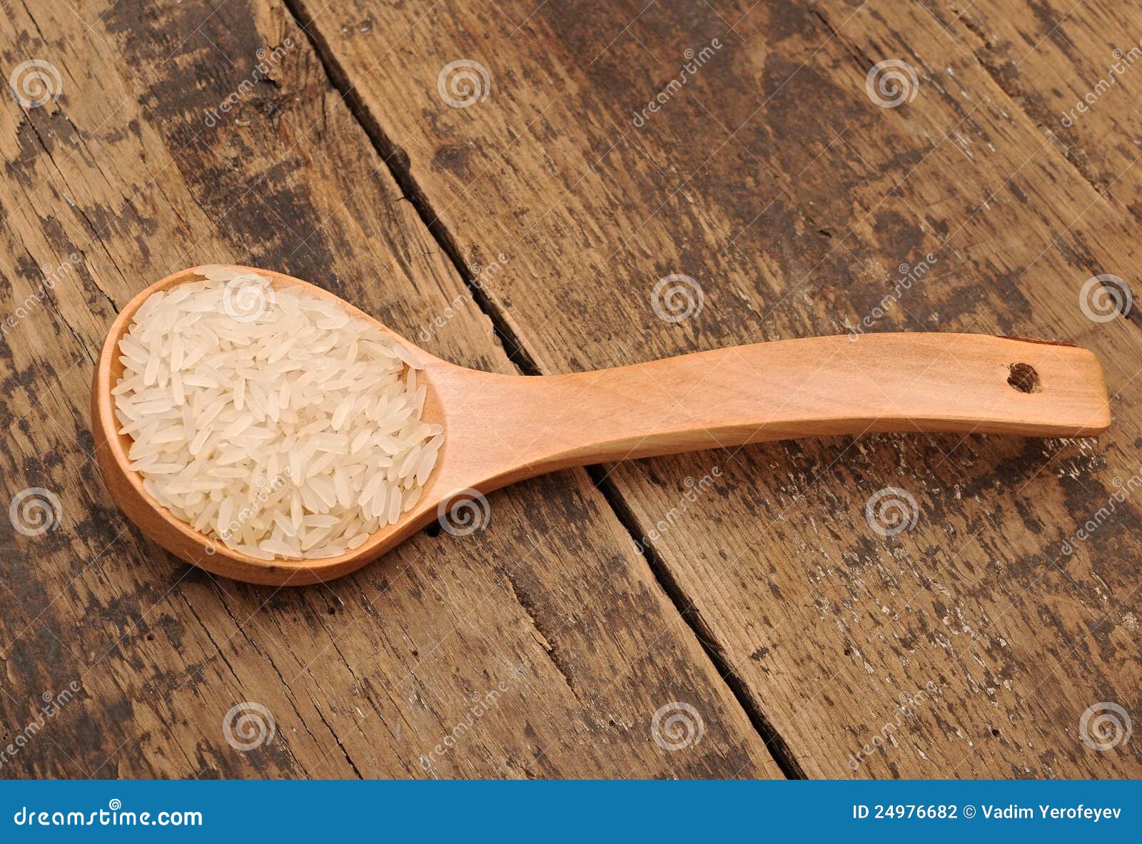 Wooden spoon with rice stock photo. Image of starch, healthy - 24976682