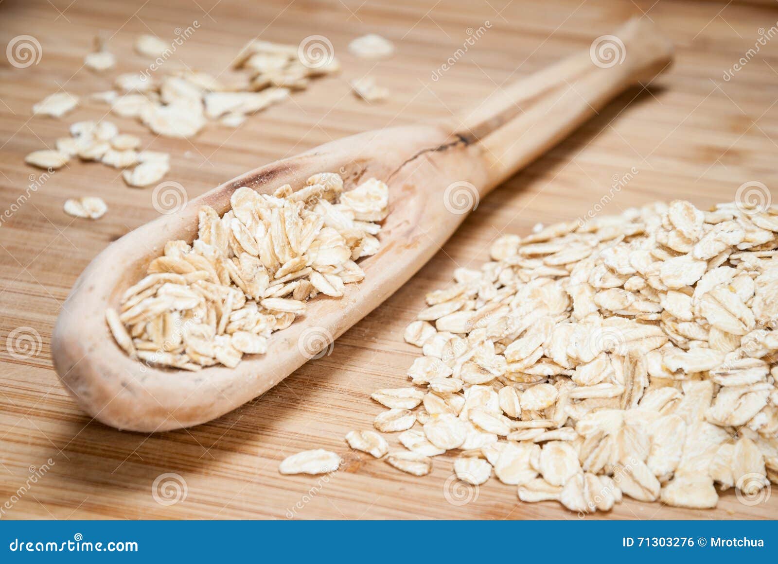 A Wooden Spoon with Rolled Oats Stock Photo - Image of organic, oatmeal ...