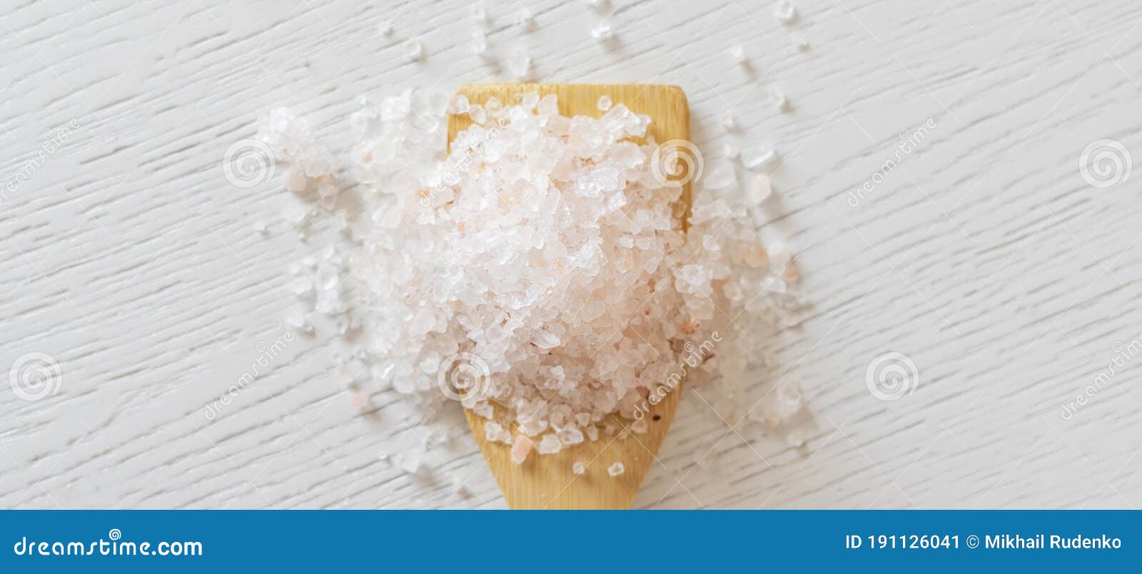 Wooden Spoon with Sea Salt on the Table, Top View Isolated Stock Image ...