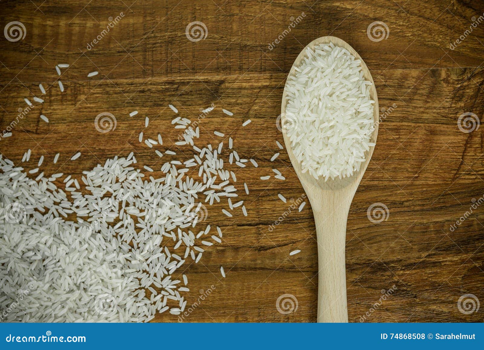 Wooden Spoon and Spilled Rice Stock Photo - Image of uncooked ...