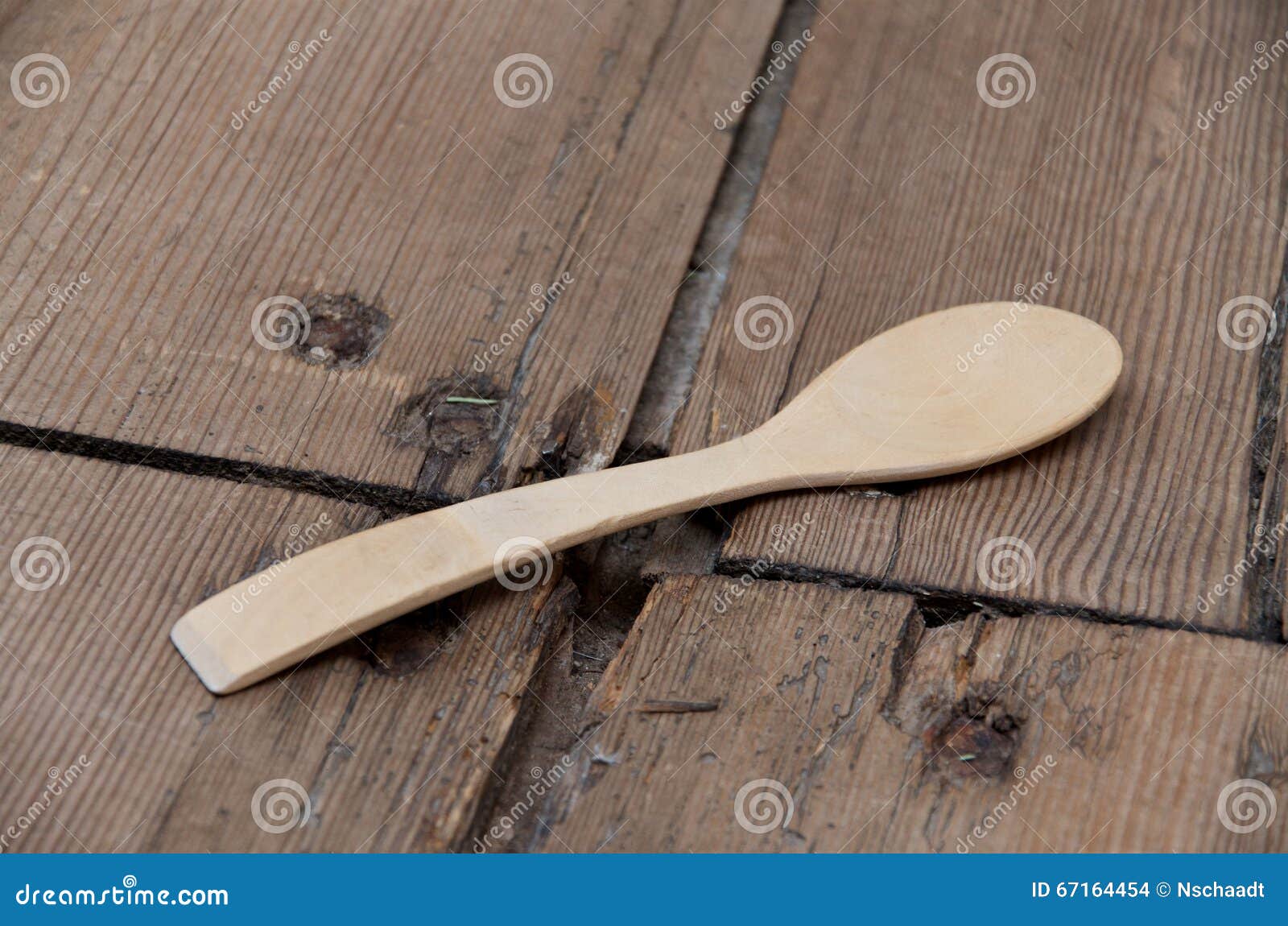 Wooden spoon on wood floor stock photo. Image of wood - 67164454