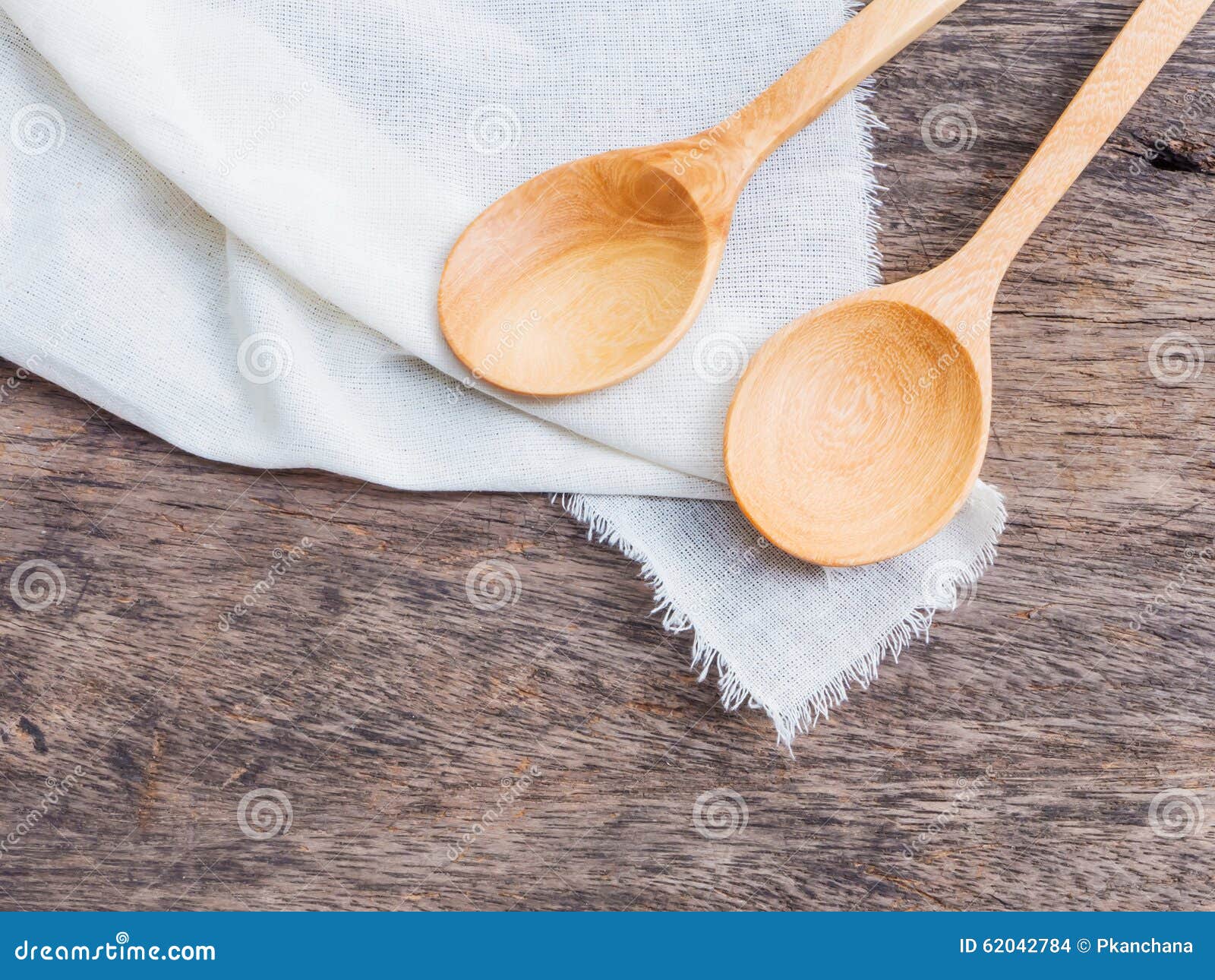 Wooden spoons on table stock photo. Image of texture - 62042784