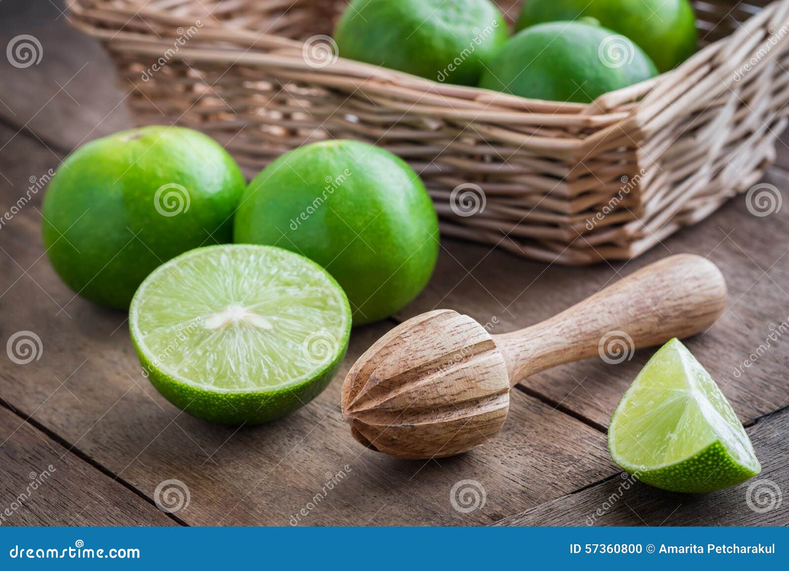 Wooden Squeezer and Lime on Table Stock Photo - Image of sour, juicy ...