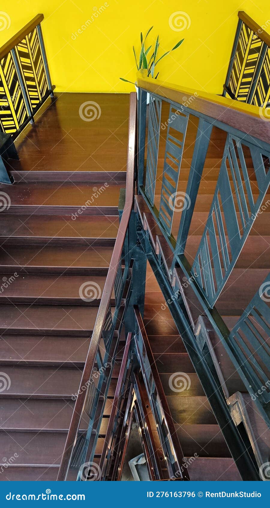 A Wooden Staircase Forming a Triangular Perspective Stock Photo - Image ...