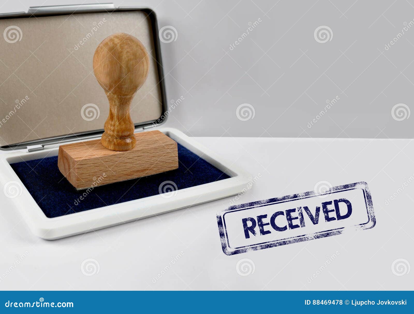 Wooden stamp RECEIVED stock photo. Image of badge, desk - 88469478