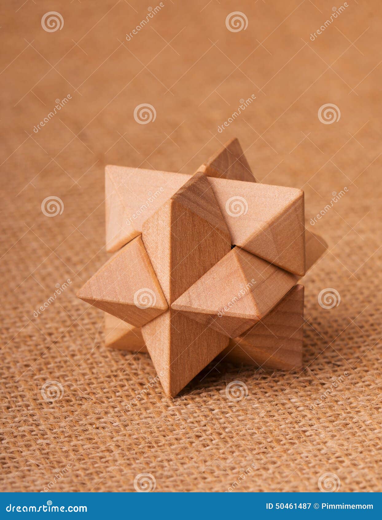 Wooden star shaped puzzle stock image. Image of tone - 50461487