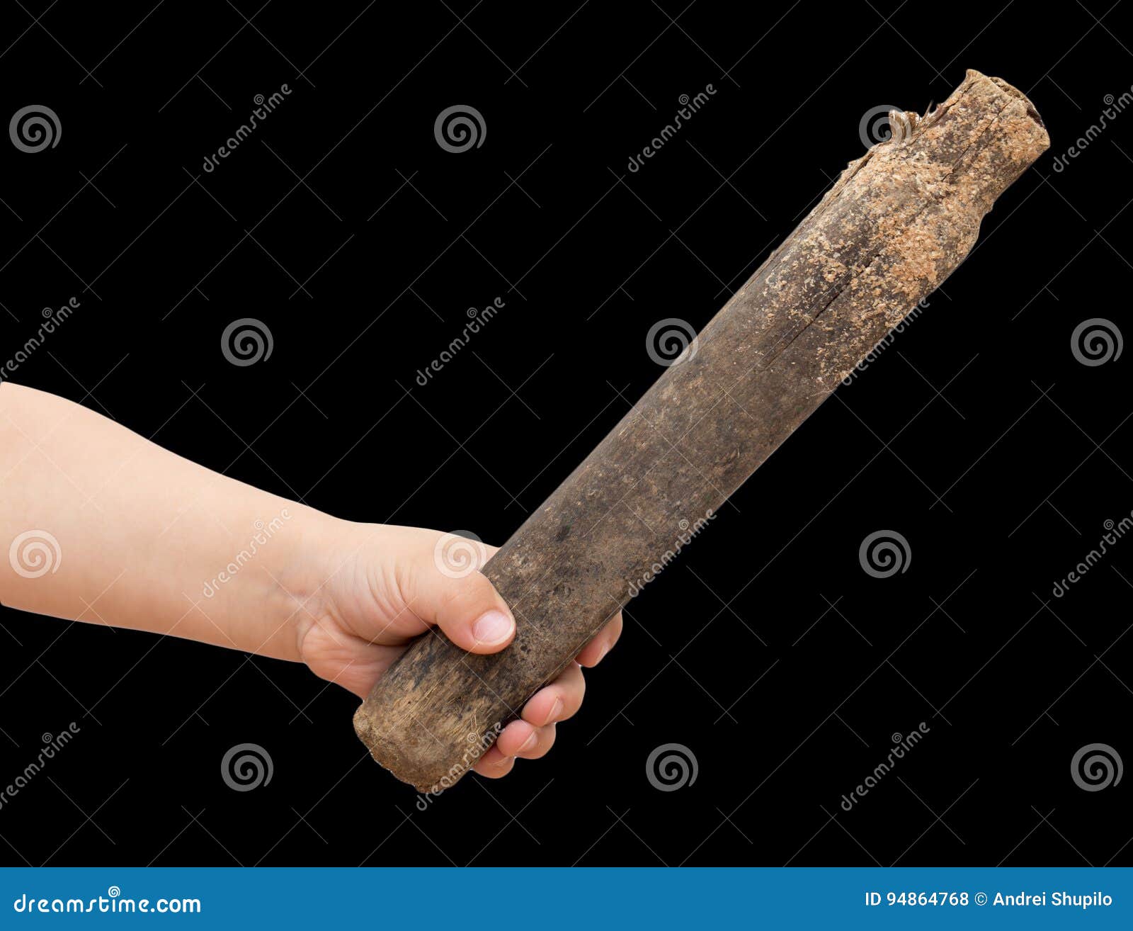 Wooden Stick in Children`s Hand on a Black Stock Photo - Image of ...