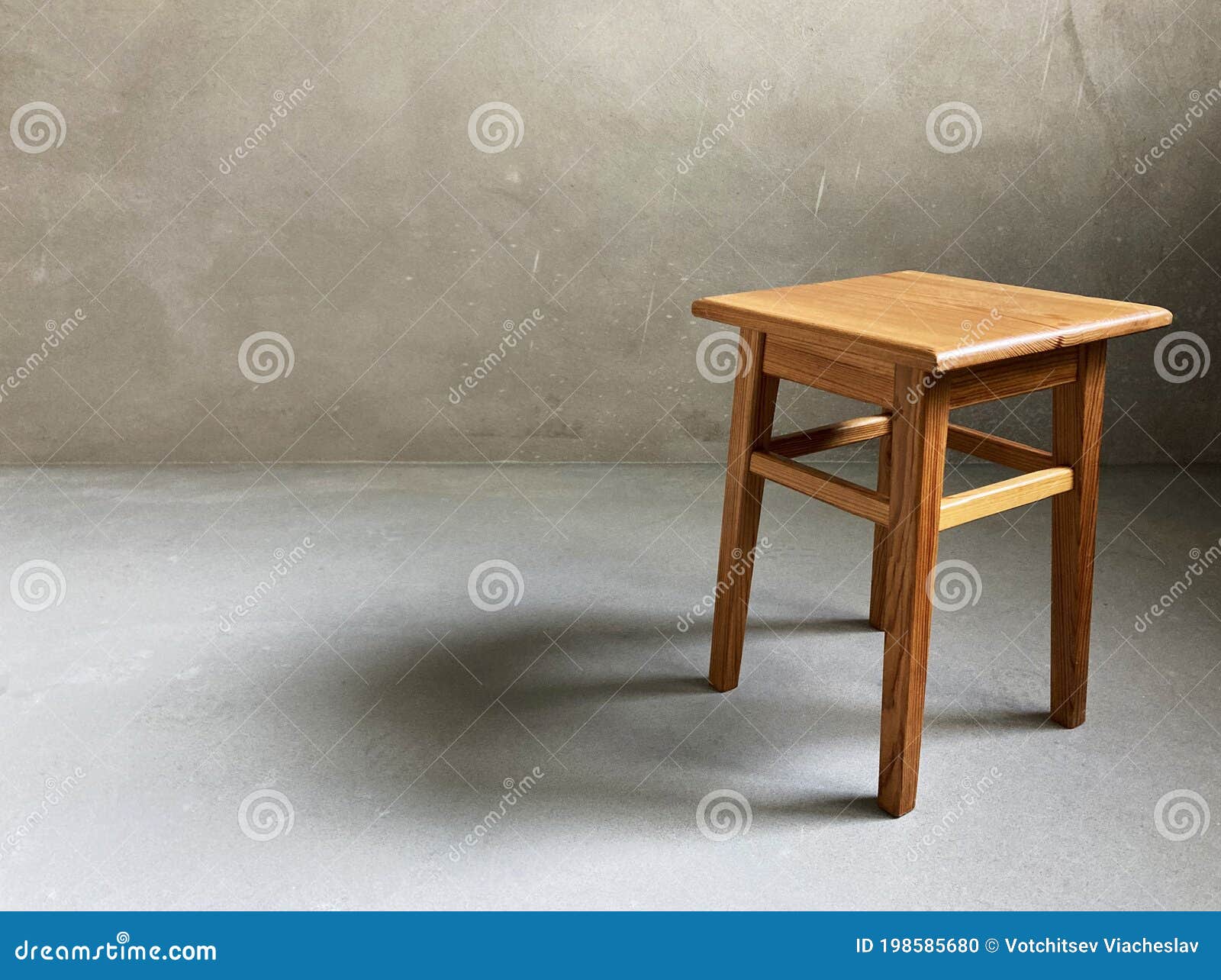 Wooden stool in room stock photo. Image of grey, closeup - 198585680