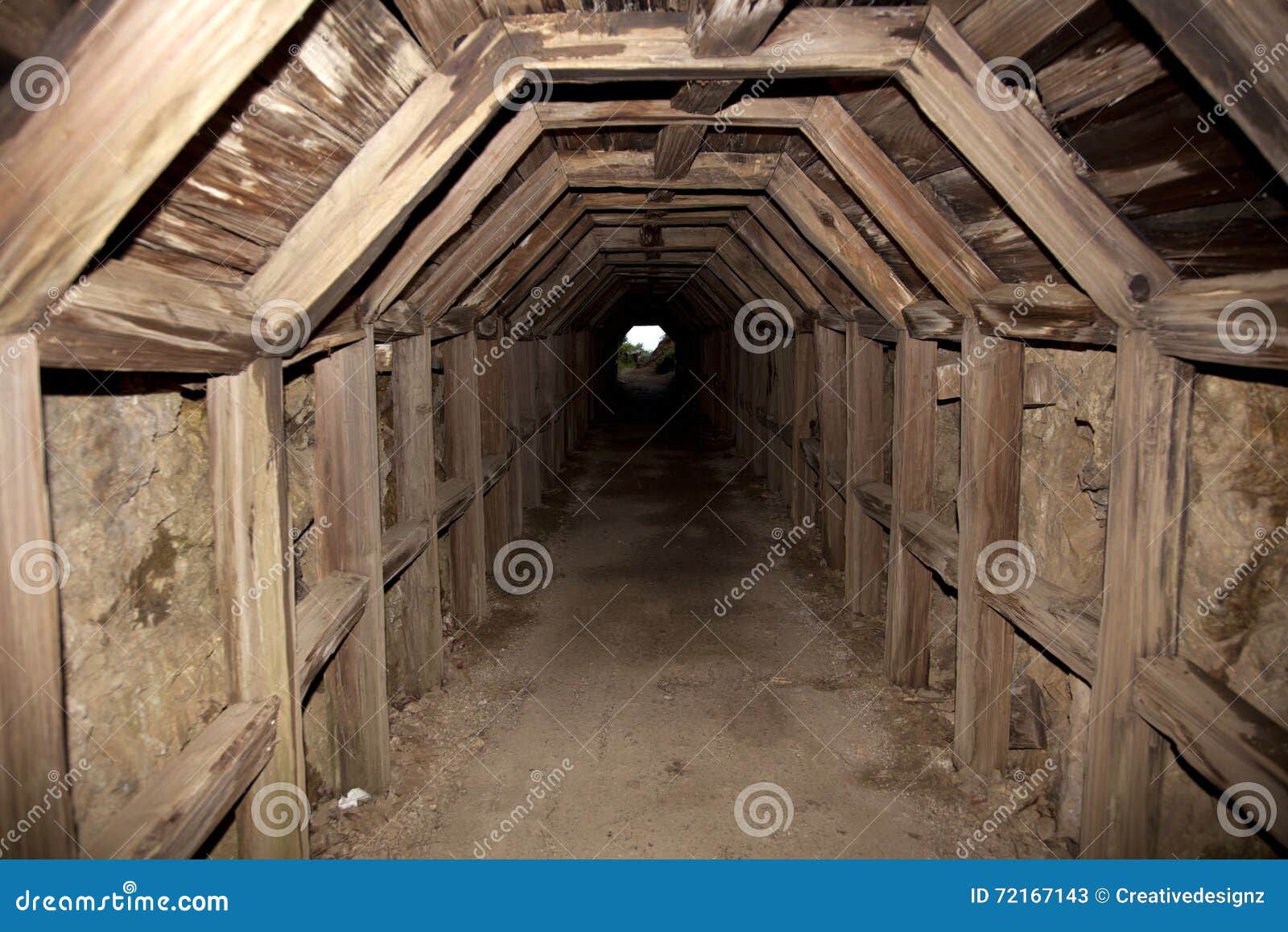 Wooden Supported Cave To the Ocean Stock Image - Image of manmade ...