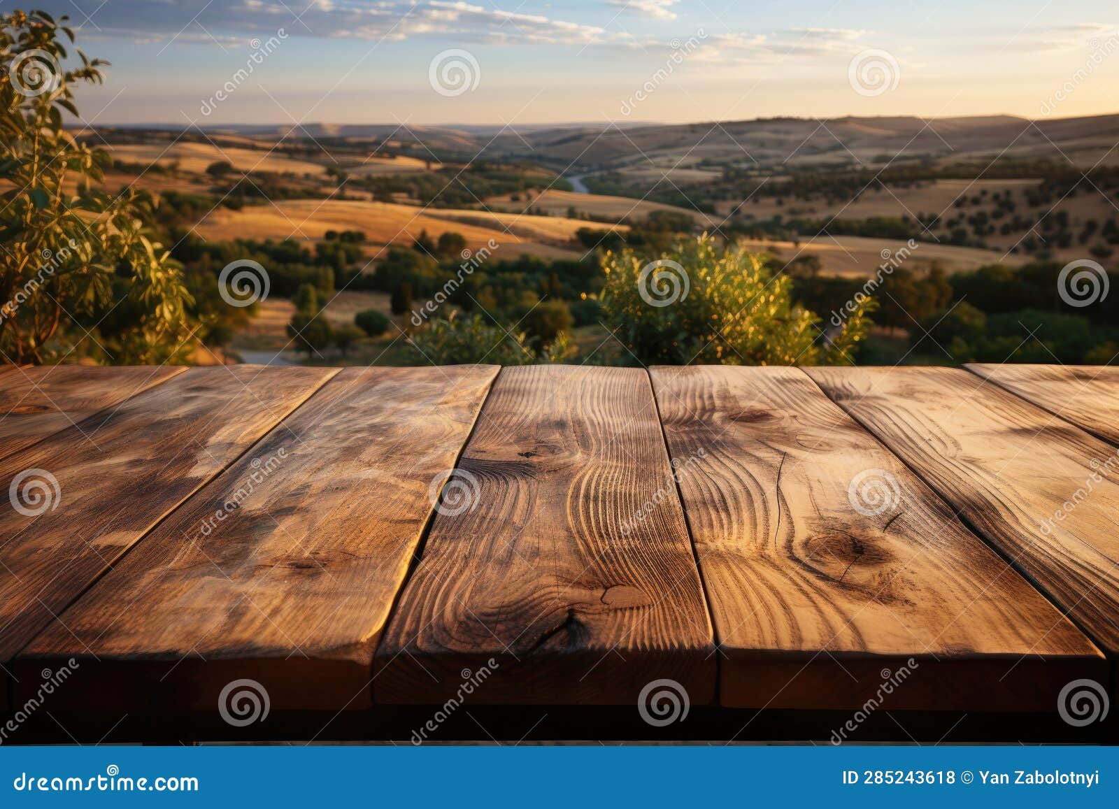 A Wooden Table Against Backdrop of Peaceful Countryside Blank Surface ...
