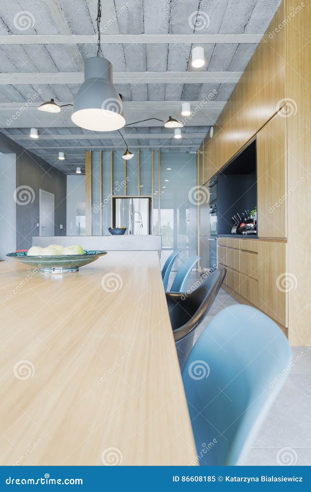 Wooden Table and Blue Chairs Stock Image - Image of kitchen, space ...