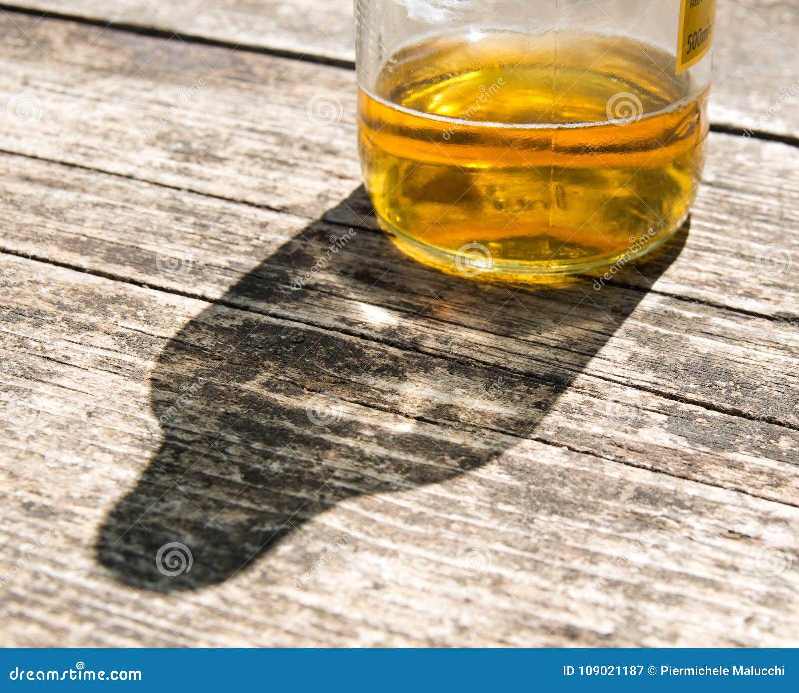 Bottom of Alcoholic Bottle Under the Sun Stock Image - Image of cafe ...