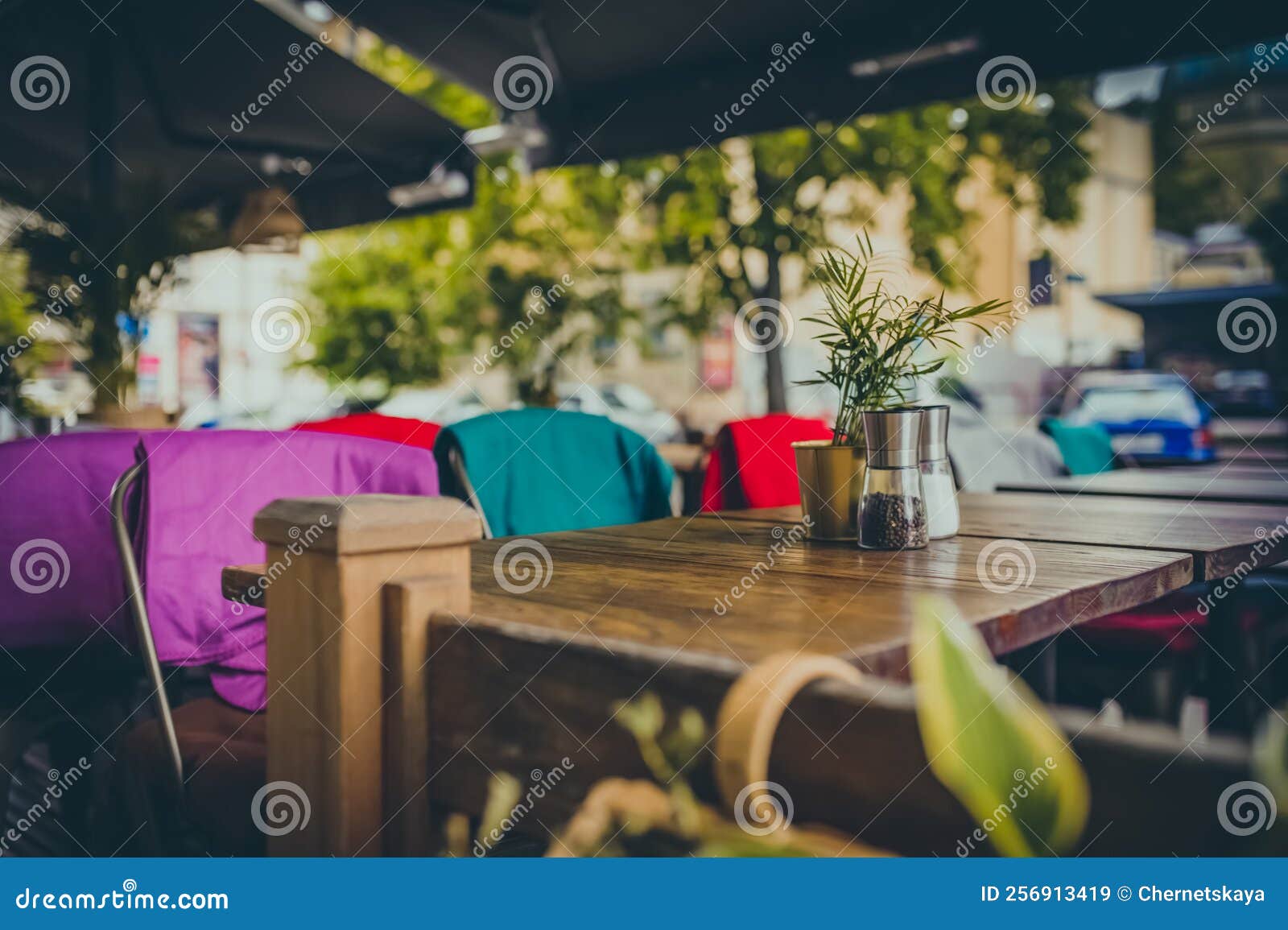Wooden Table and Comfortable Chairs in Outdoor Cafe Stock Image - Image ...