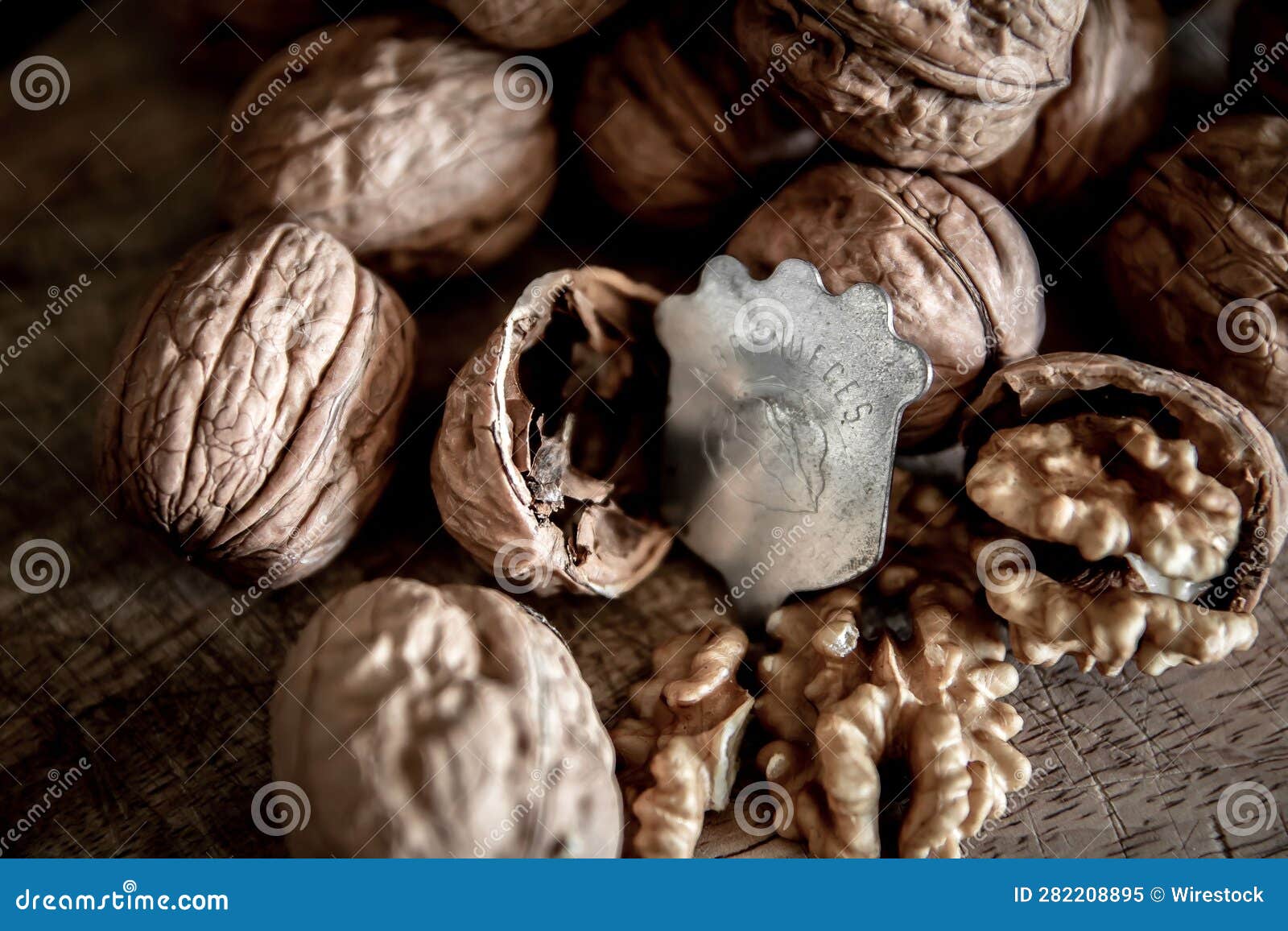 A Mixture of Nuts are on a Wooden Table and Some are Missing Their ...