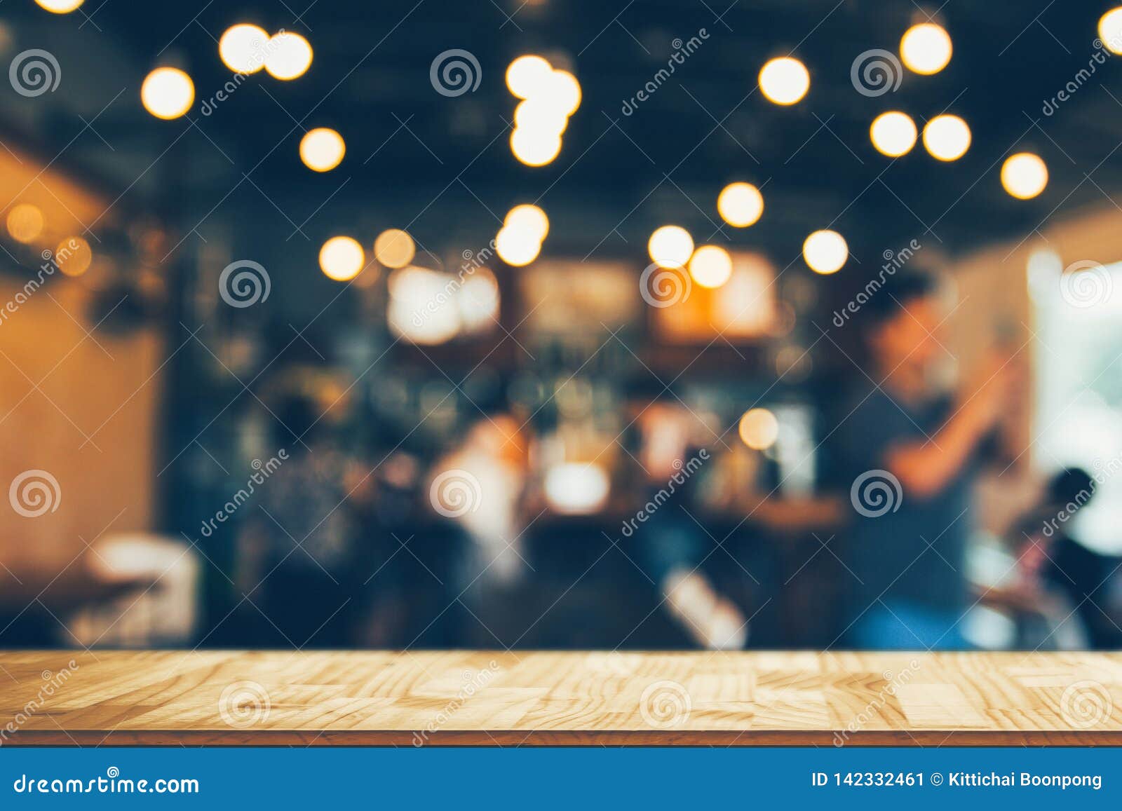 Wooden Table in Front of Abstract Blurred Coffee Shop Lights Background ...