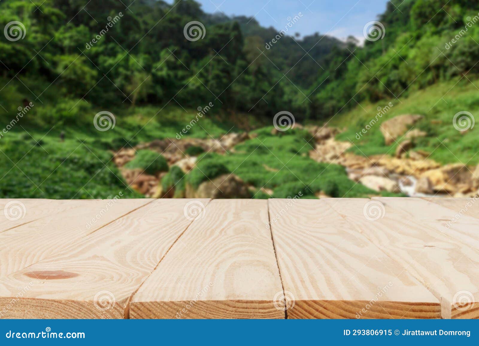 Wooden Table in Front of Abstract Blurred in View of the Forest ...