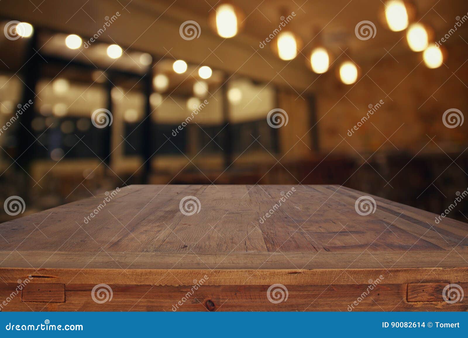 Wooden Table in Front of Abstract Restaurant Lights Background Stock ...