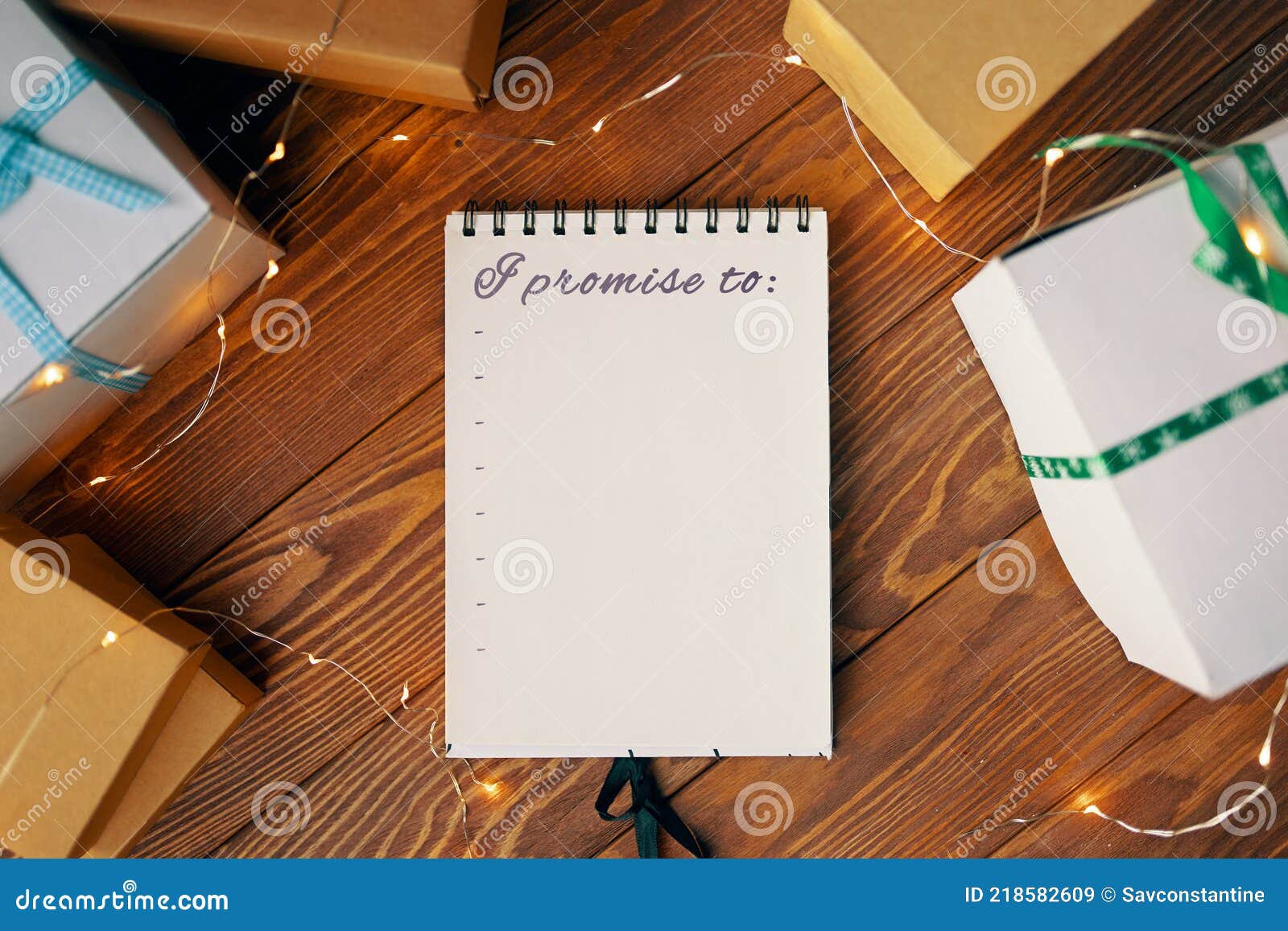 Wooden Table with Gift Boxes and Notepad. Stock Image - Image of ...