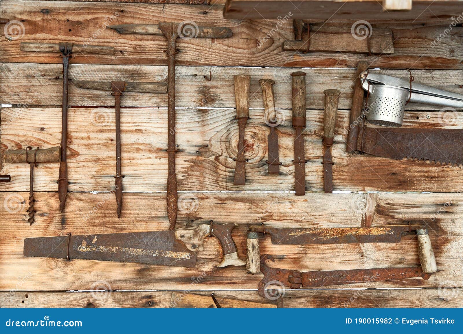 On a Wooden Table are Old, Ancient, Rusty Construction Tools. Editorial ...