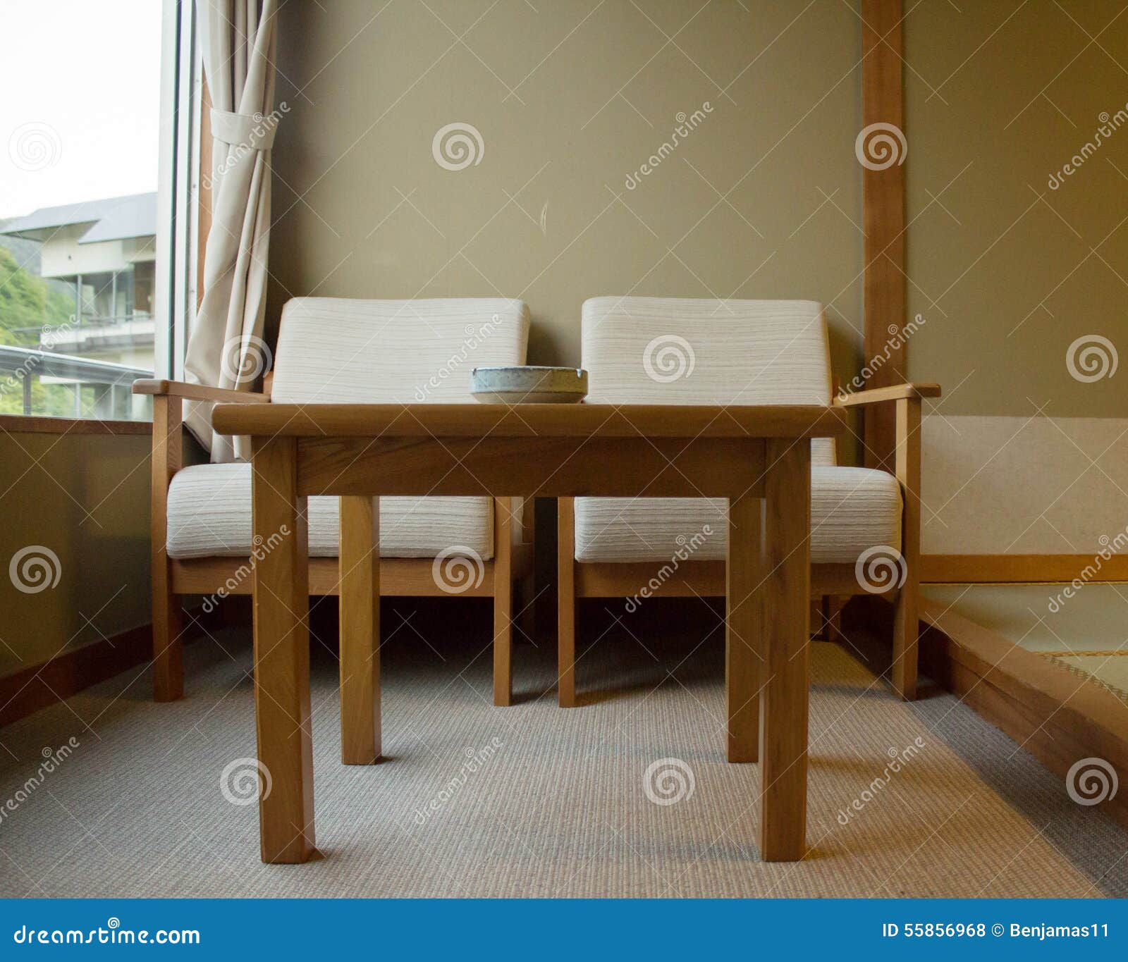 Wooden table by the window stock photo. Image of beige - 55856968