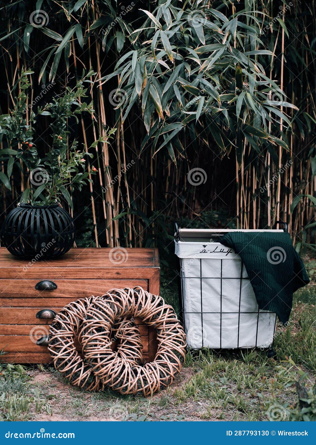 Wooden Tabletop with a Metal Planter and a Storage Container Sitting ...