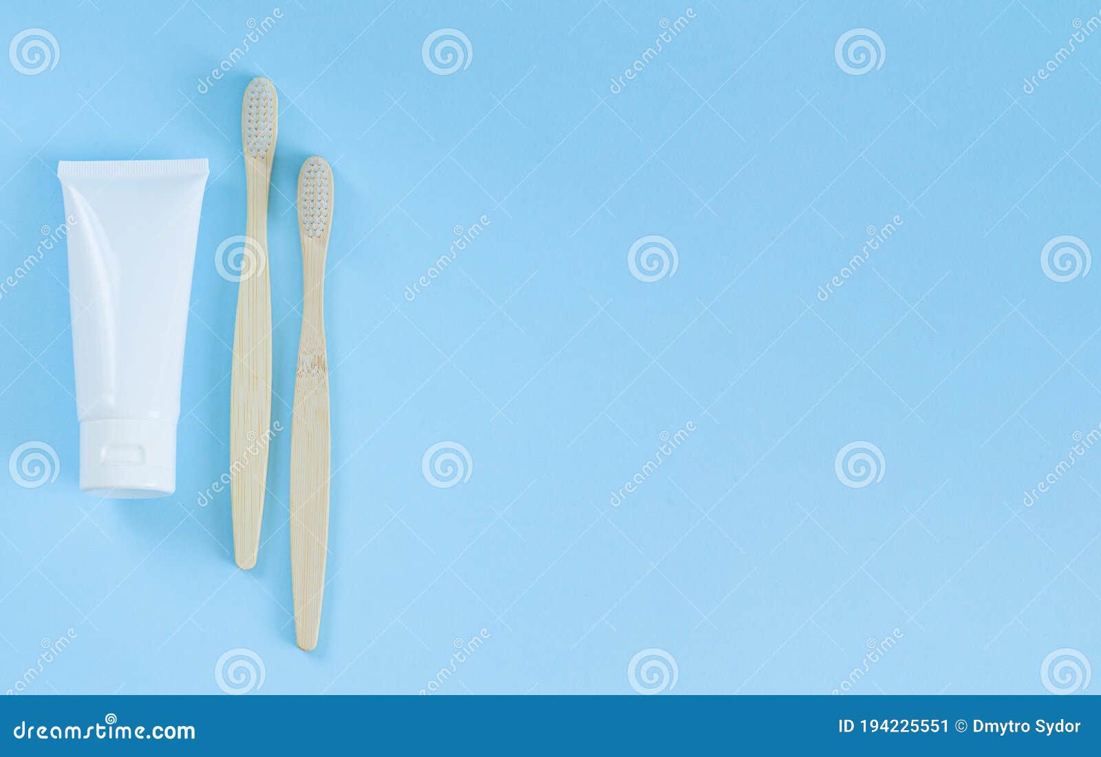 Wooden Toothbrushes and Toothpaste Top View on Light Blue Background ...