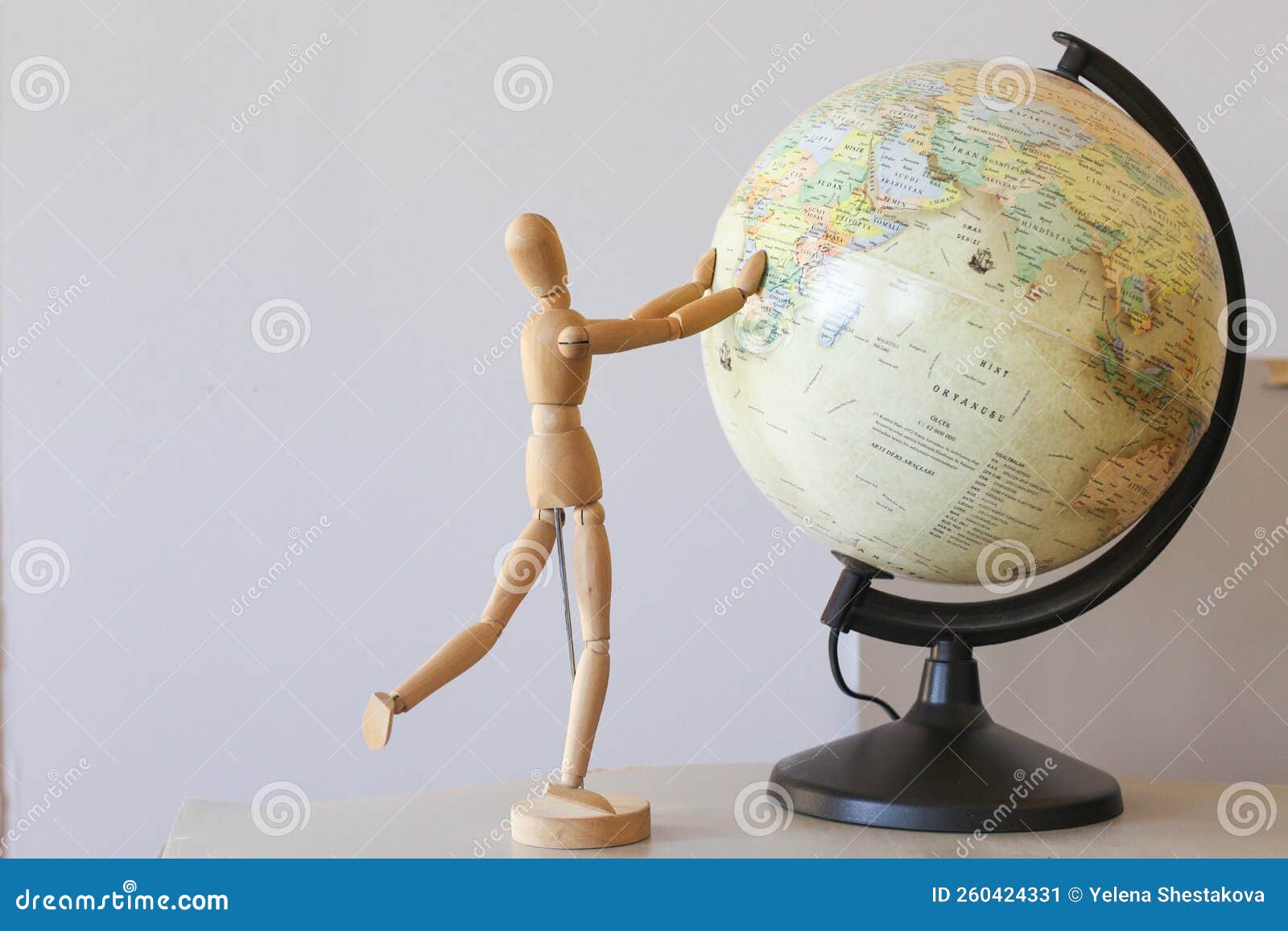 The Wooden Toy Man is Holding the Earth Globe Stock Image - Image of ...