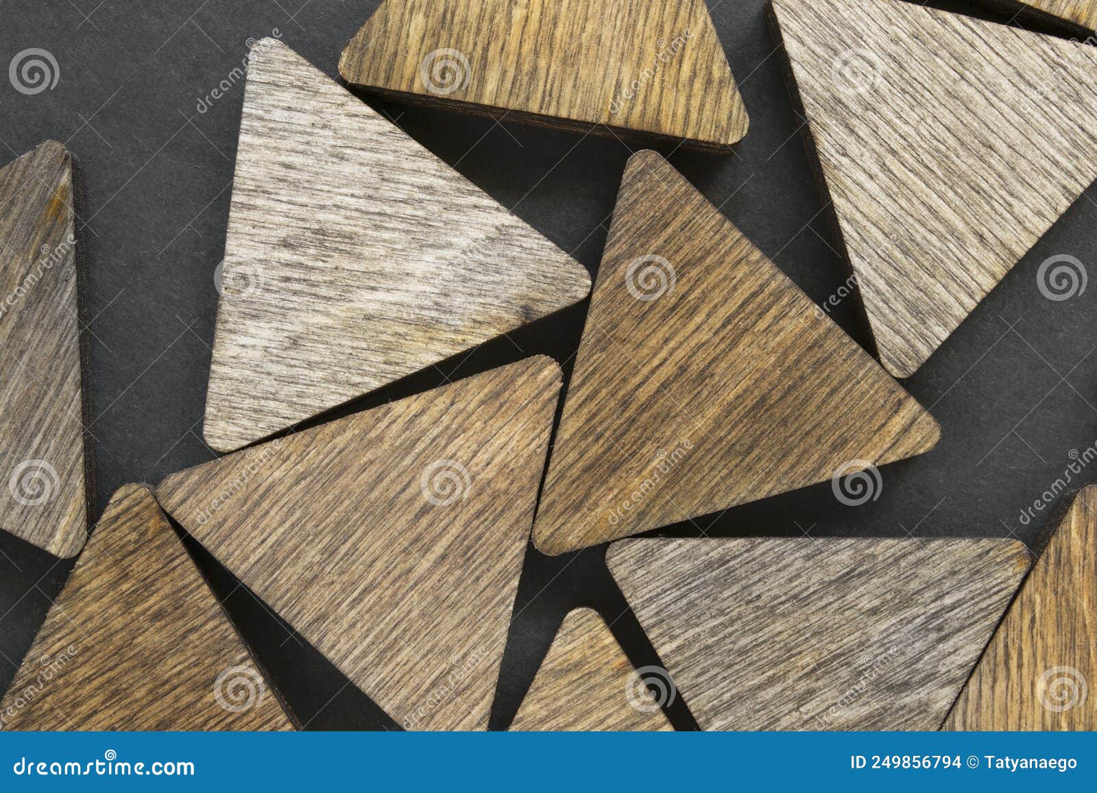 Wooden triangle pieces stock photo. Image of details - 249856794