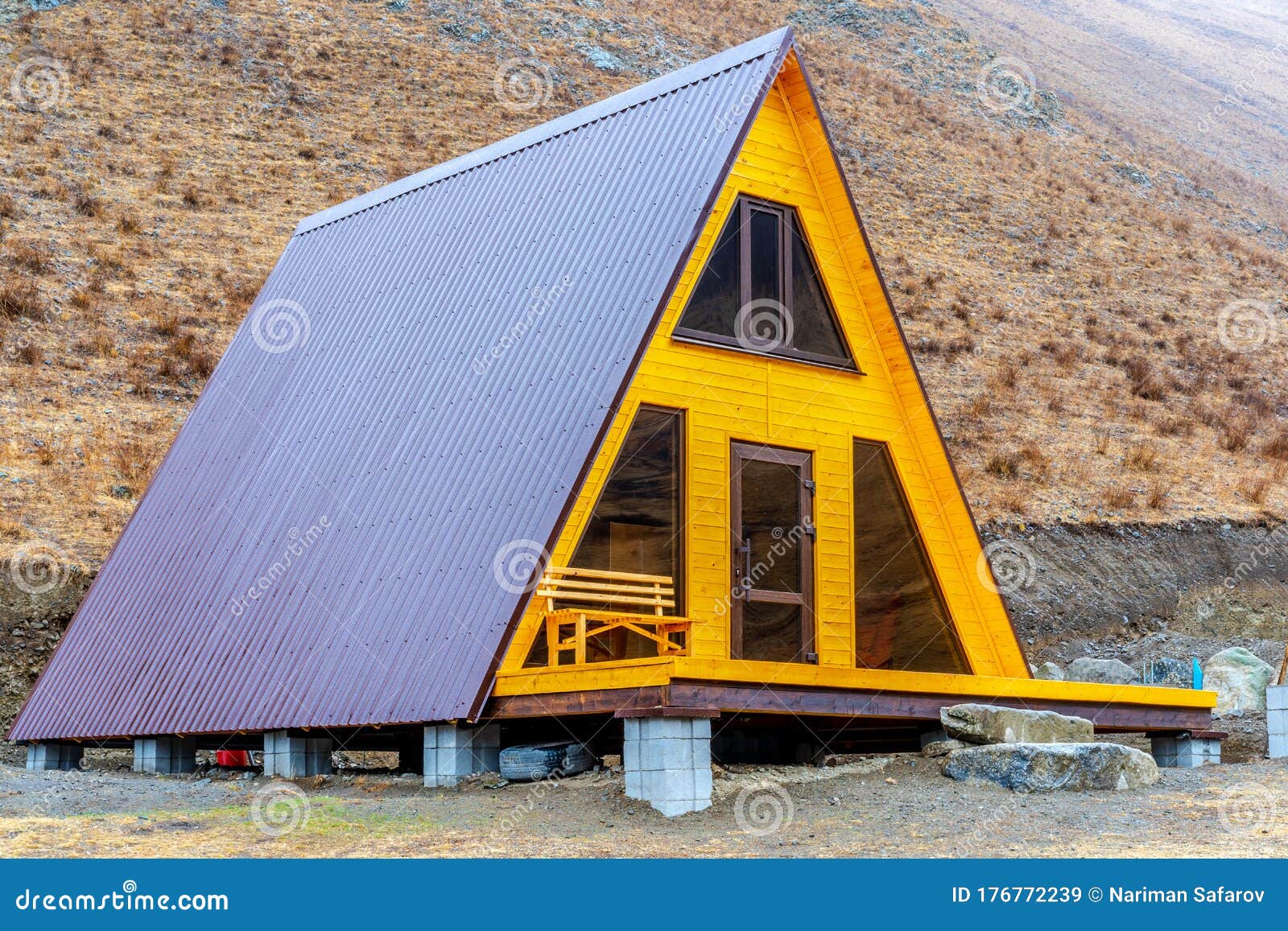 Wooden Triangular House Built in the Mountains Stock Image - Image of ...