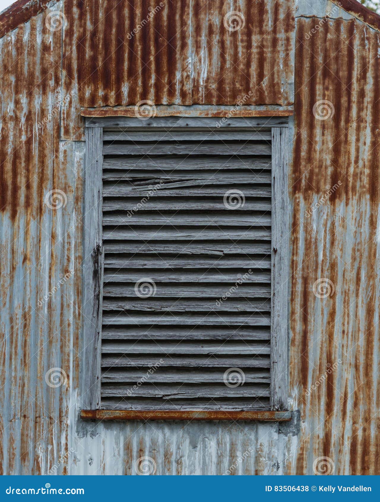 Wooden Vent on Rusted Building Vertical Stock Photo - Image of ...