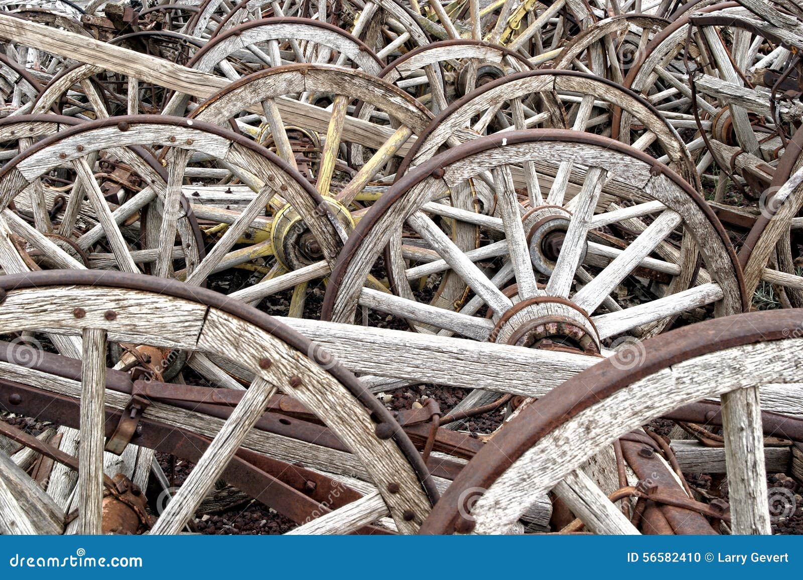 Wooden wagon wheels stock photo. Image of farm, corrosion - 56582410