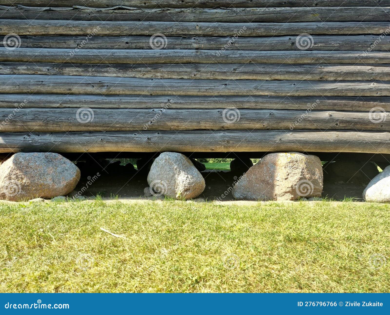 Stone Foundations From Ruins On Green Grass Go Into Linear Perspective ...