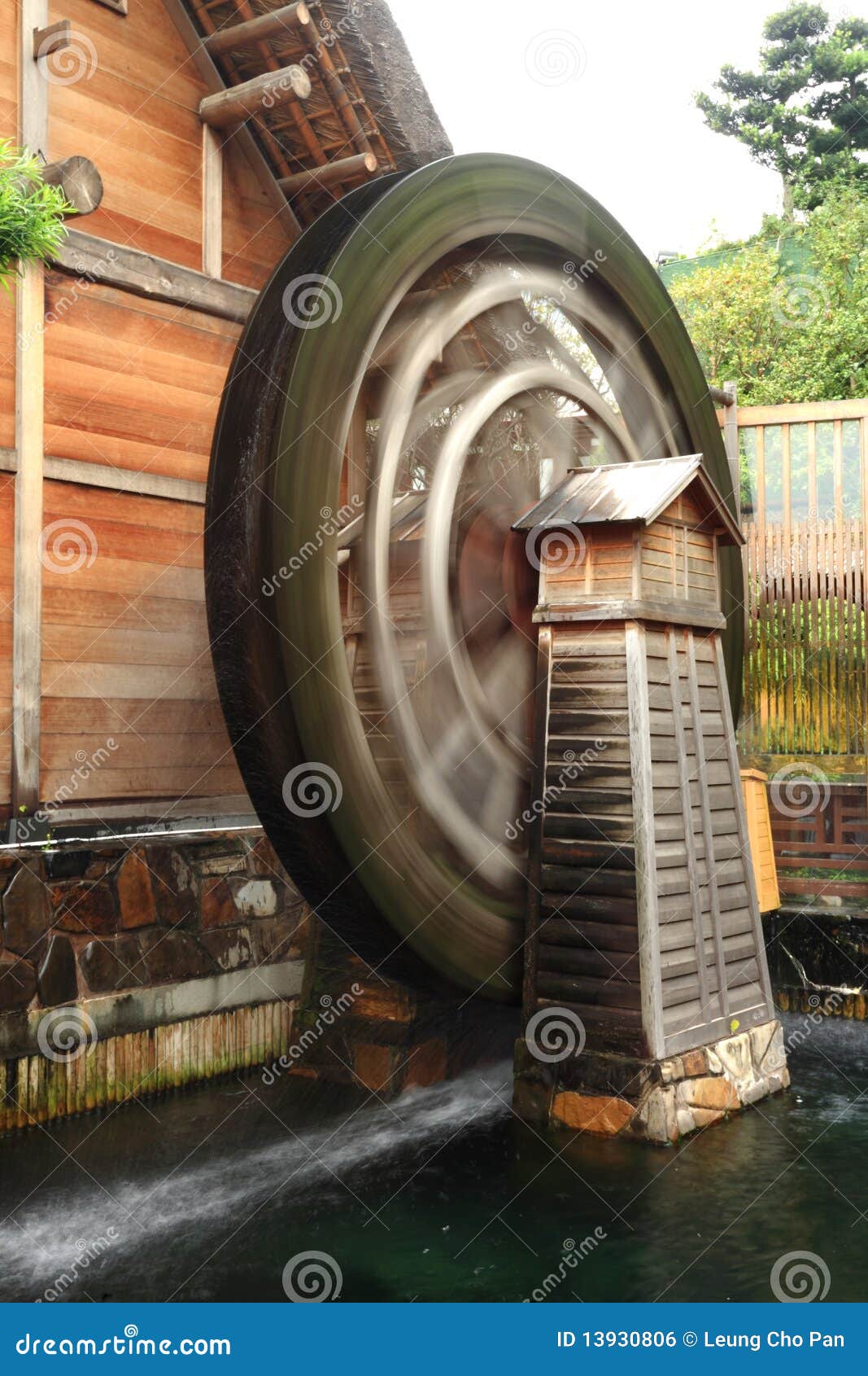 Wooden waterwheel rotating stock photo. Image of architecture - 13930806