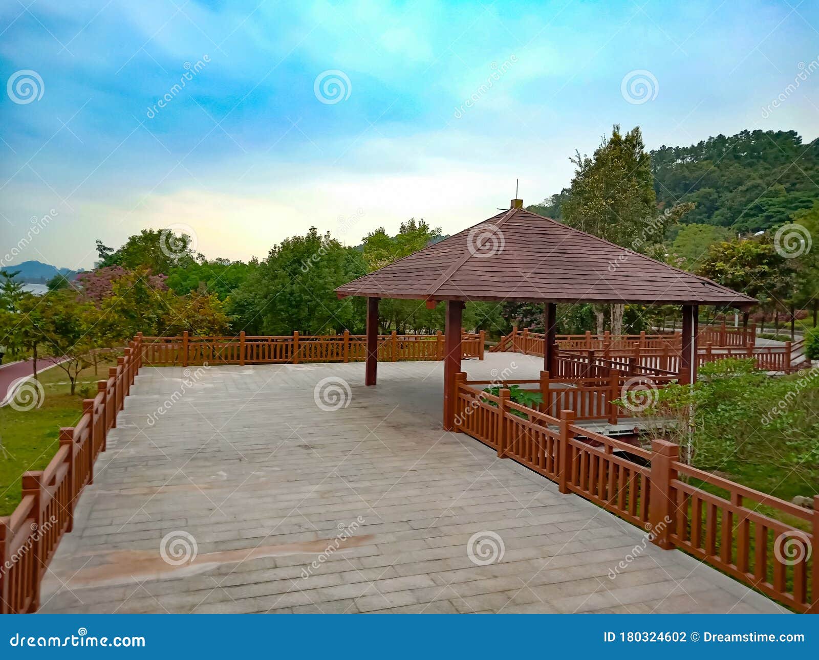 Wooden Way Boundary and a Hut in Park Editorial Photography - Image of ...