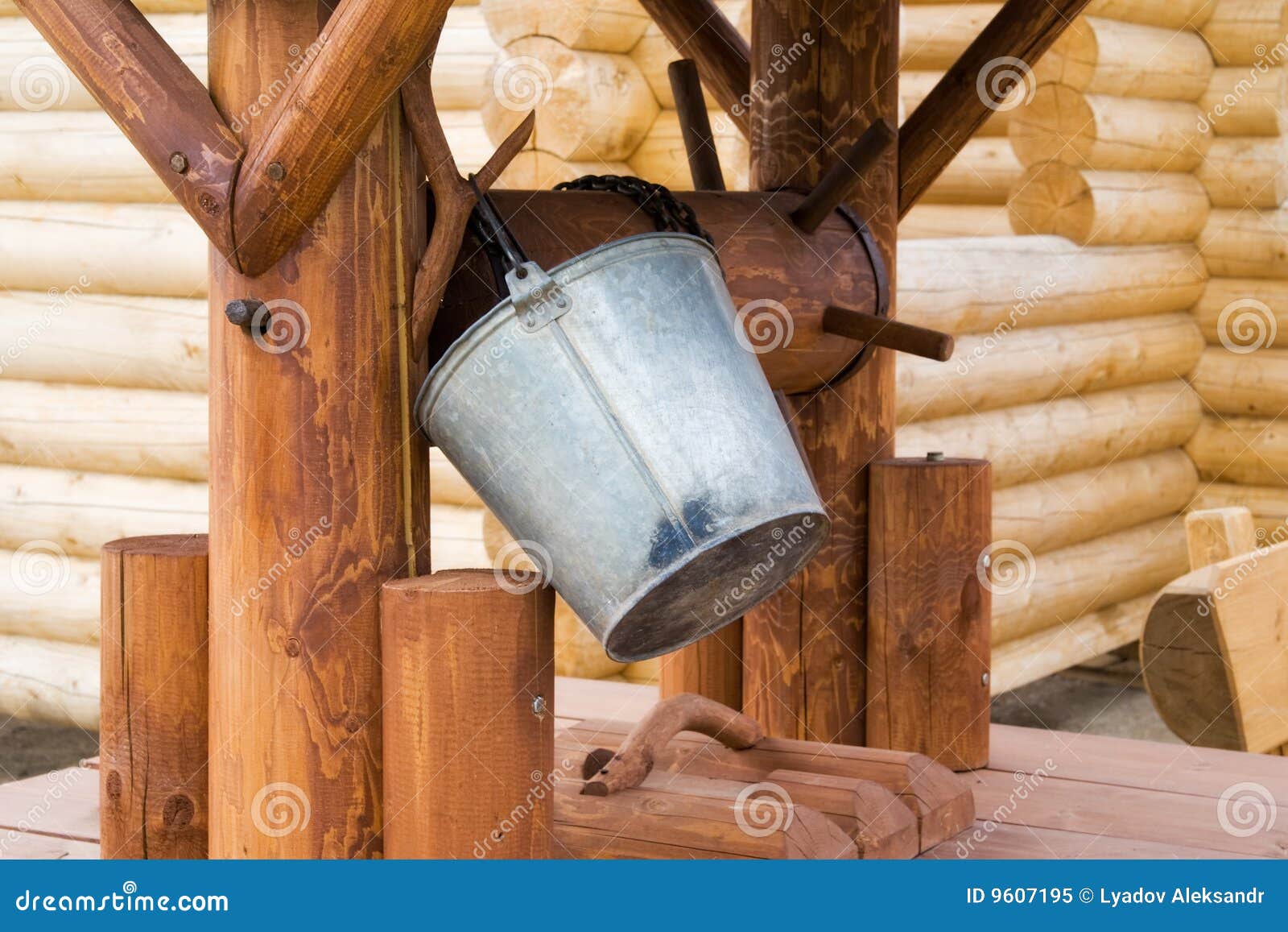 Wooden well with a bucket stock image. Image of bucket - 9607195