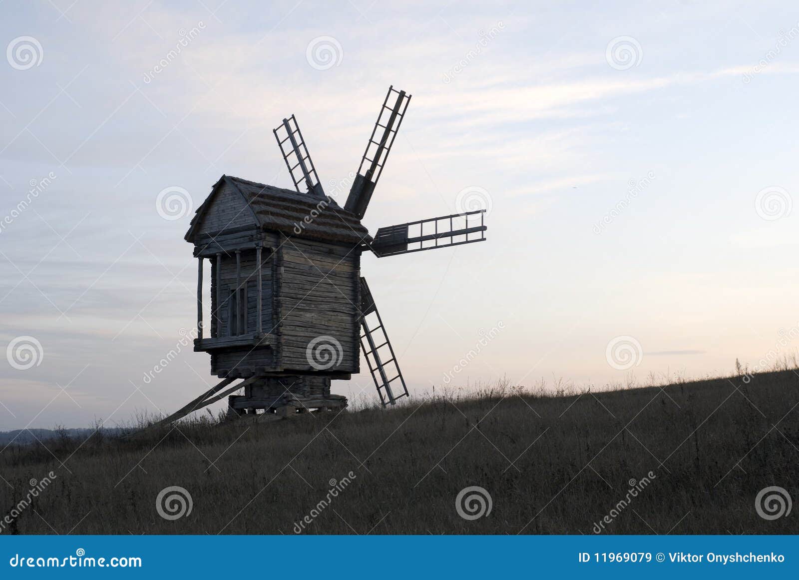 Wooden windmill in evening stock image. Image of country - 11969079