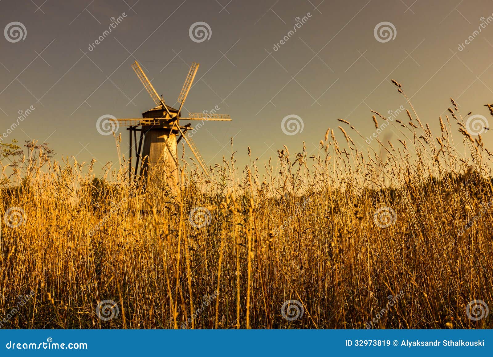 Wooden windmill in sunset stock image. Image of landscape - 32973819