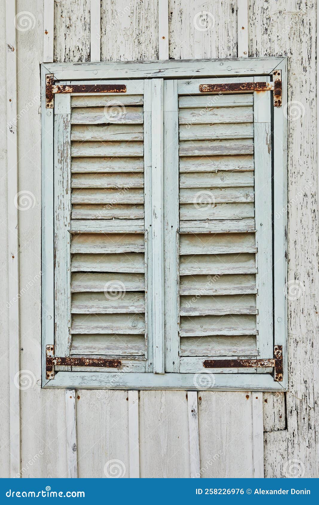 Wooden Windows and Shutters Painted Blue in House at Sunset Stock Photo ...