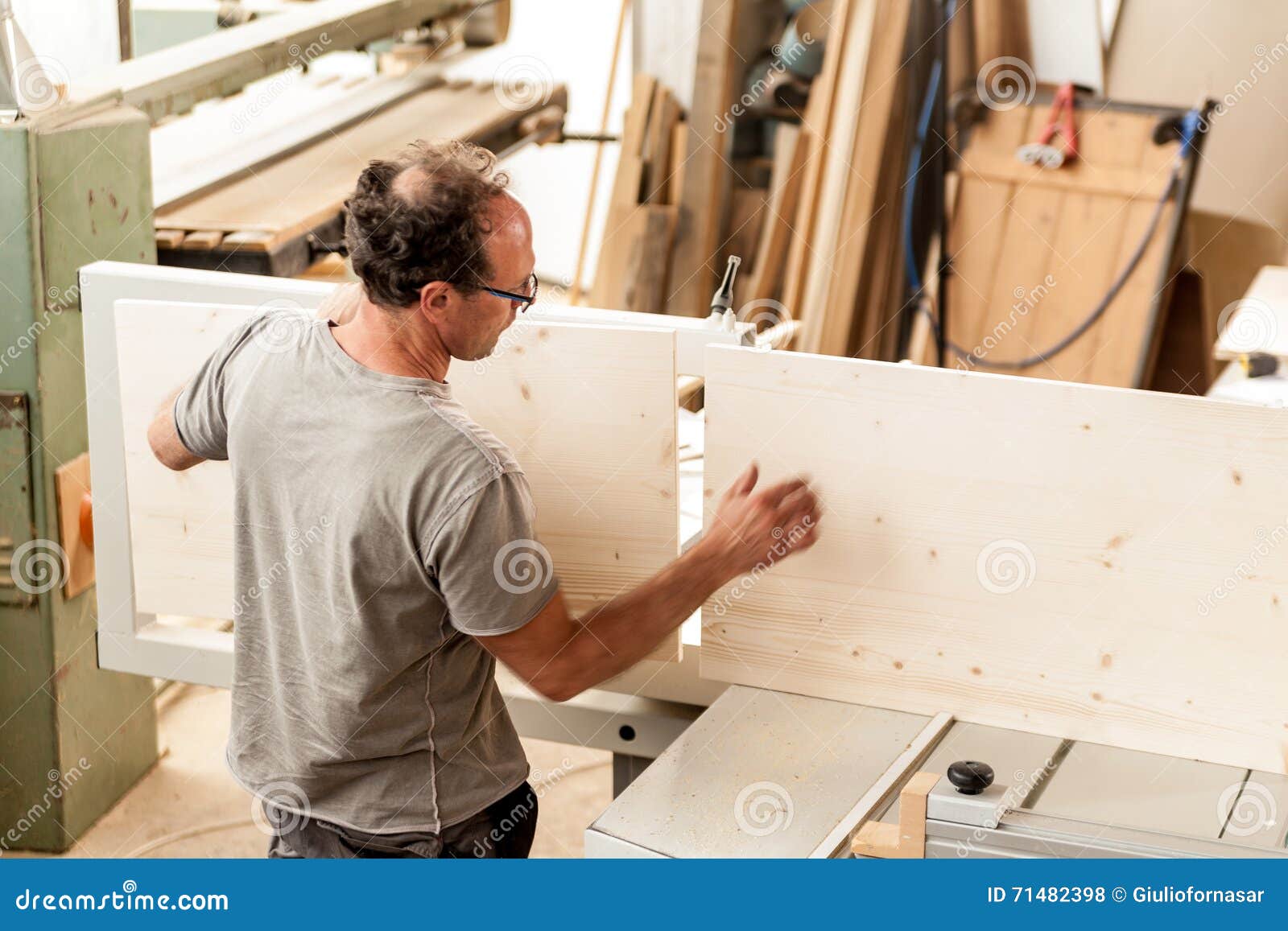 Woodworker Assembling a Piece of Furniture Stock Photo - Image of ...