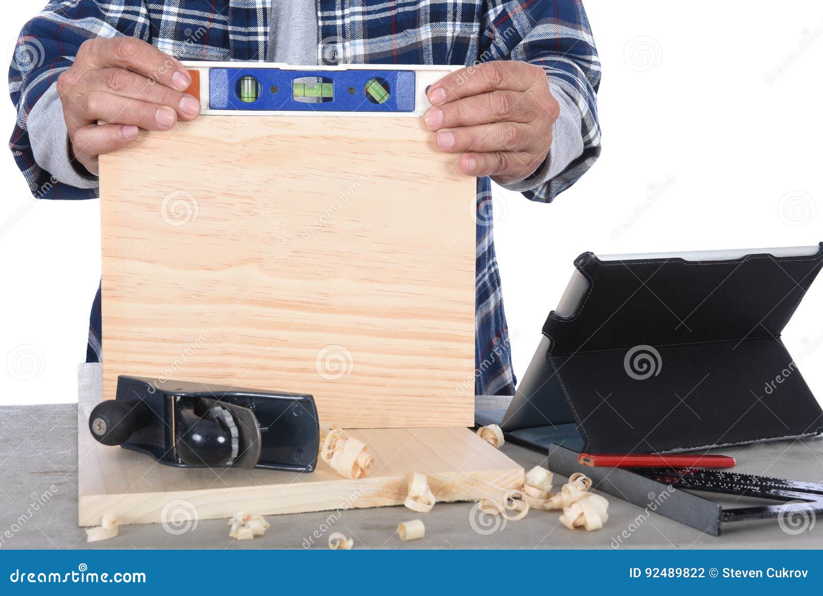 Woodworker Checking Level stock photo. Image of craftsman - 92489822