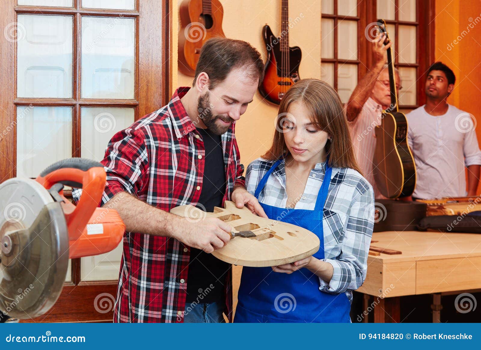 Woodworker Shows Apprentice Guitar Building Stock Photo - Image of ...