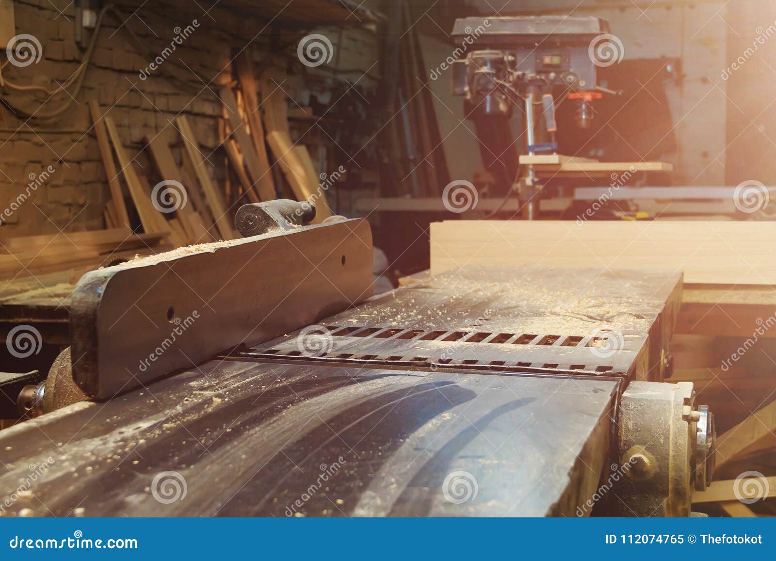 Woodworking Plane Machine in Carpentry Workshop. Machine Tool in ...