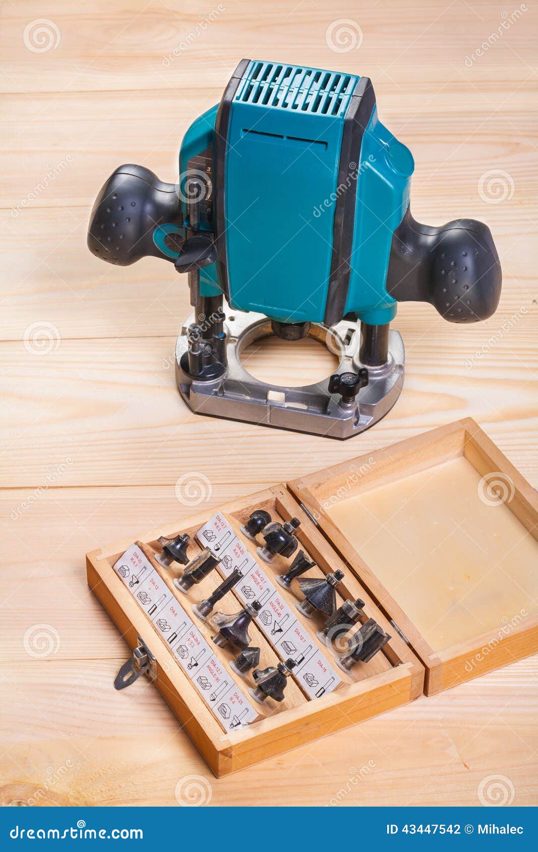Woodworking Tools Plunge Pouter and Set of Roundover Router Bits Stock ...