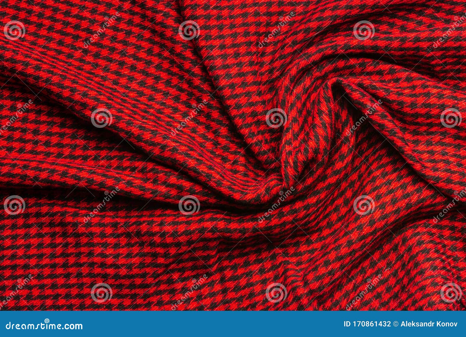 Wool Crumpled Cloth in a Small Black Cage on a Red Background Stock ...