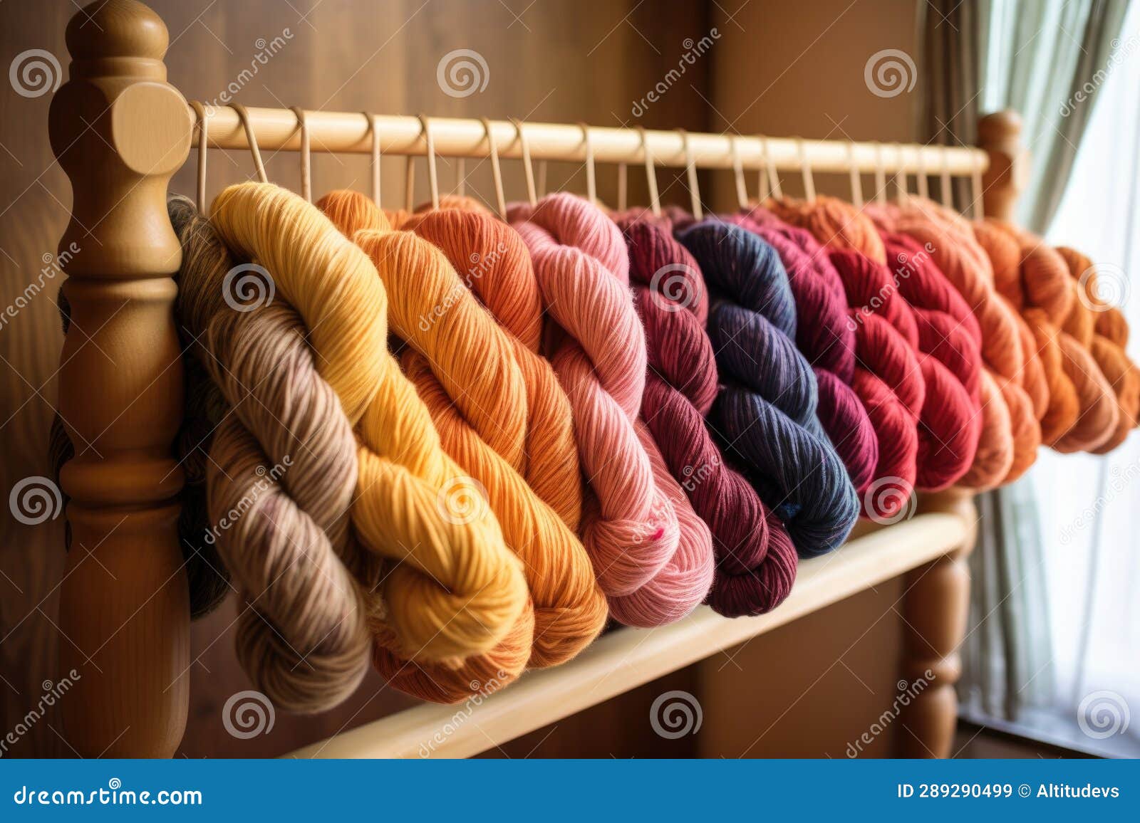 Wool Skeins Hanging on a Wooden Rack, Ready for Spinning Stock Image ...